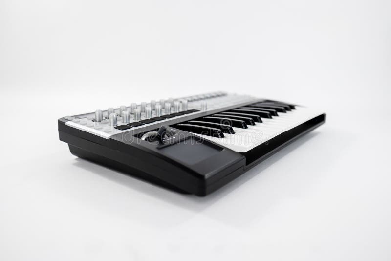 Modern Electronic Keyboard with Knobs and Keys in Studio Setting Stock ...
