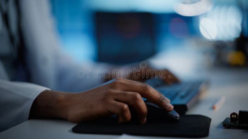 Modern Electronics Research, Development Facility: Engineer Working on ...