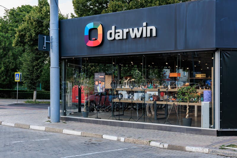 Modern Electronics Storefront with Glass Display and Urban Setting ...