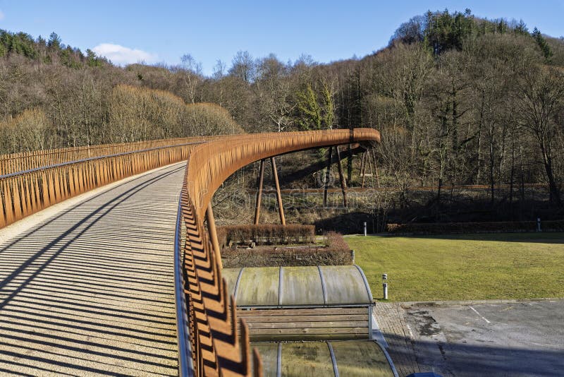 Modern Elevated Walkway Over a Scenic Forest Landscape in Daylight ...
