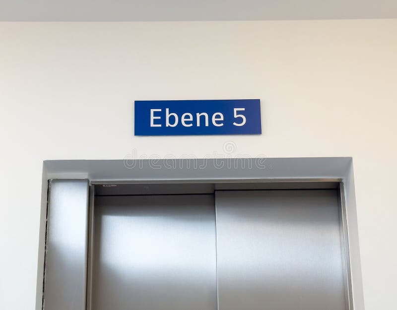 Modern Elevator Door with Floor 5 Sign in Minimalist Interior Design ...