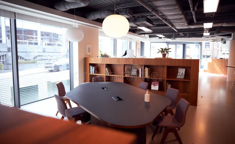 Modern Empty Co-sharing Office with Hand Sanitizer on Table Stock Image ...