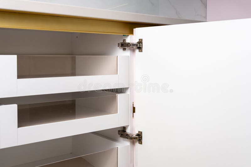 A Modern, Empty Kitchen Cabinet Featuring Sleek White Design and ...