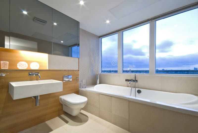 Modern En-suite Bathroom with Large Window Stock Photo - Image of ...