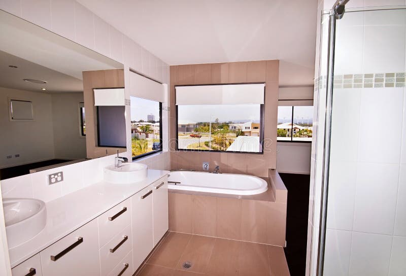 Modern Ensuite Bathroom stock image. Image of windows - 12930349