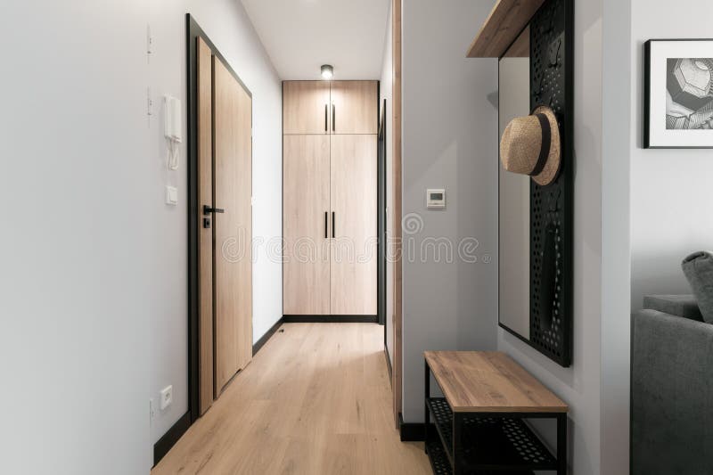 Modern Entryway with Wooden Accents and Hat Rack Stock Photo - Image of ... Modern Entryway with Wooden Accents and Hat Rack Stock Photo - Image of ...