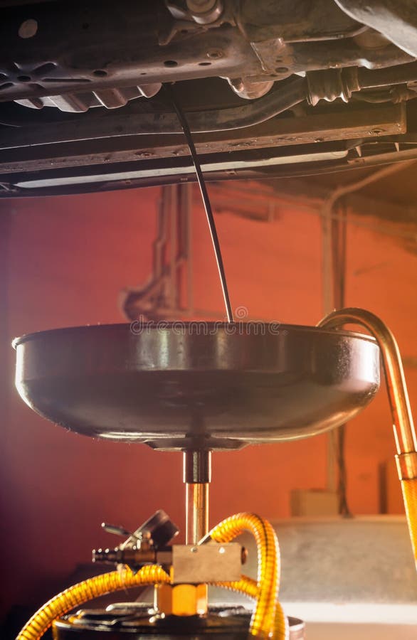 Modern Equipment for Changing Motor Oil in Automobile Engine Stock ...