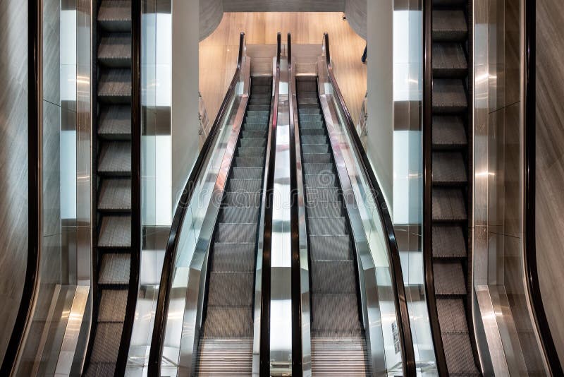 Parallel escalator stock image. Image of architecture - 20953531
