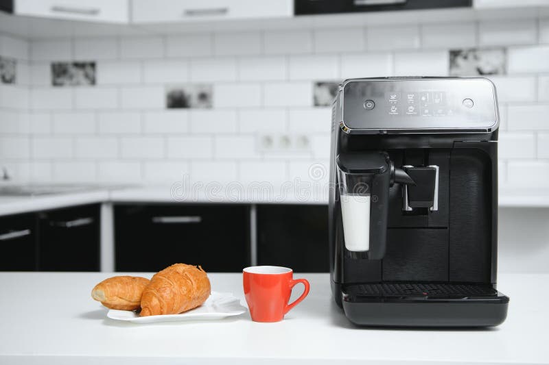 Modern Espresso Coffee Machine with a Cup in Interior of Kitchen ...