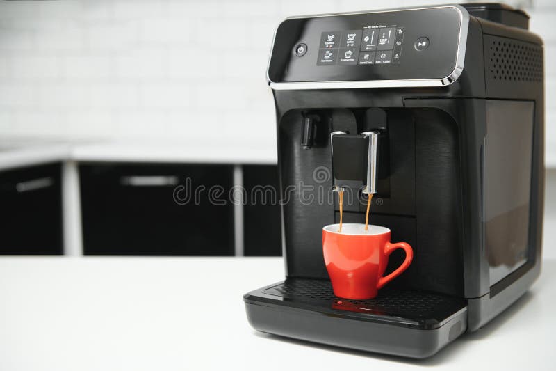 Modern Espresso Coffee Machine with a Cup in Kitchen Stock Photo ...