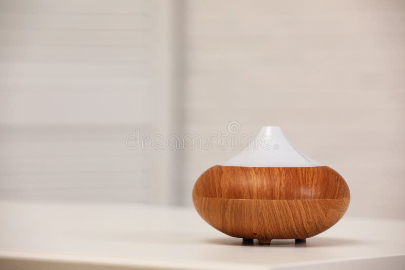 Modern Essential Oil Diffuser on Table Indoors Stock Image - Image of ...