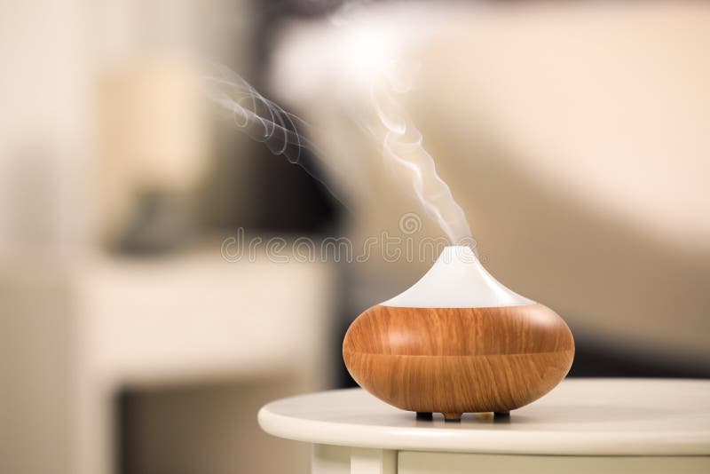 Modern Essential Oil Diffuser on Table Indoors Stock Image - Image of ...