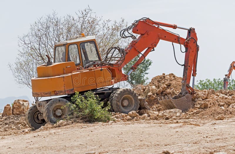 Modern Excavator Performs Excavation Work Stock Photo - Image of ...