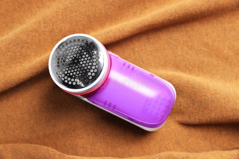 Modern Fabric Shaver on Brown Cloth, Top View Stock Image - Image of ...