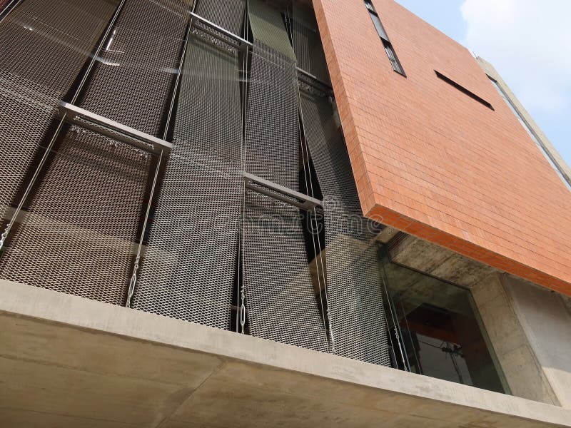 Modern Facade Building with Mesh Panel Facade Stock Image - Image of ...