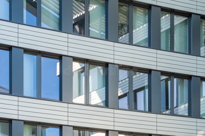 Modern Facade of Office Buildings with Stainless Steel Elements and ...