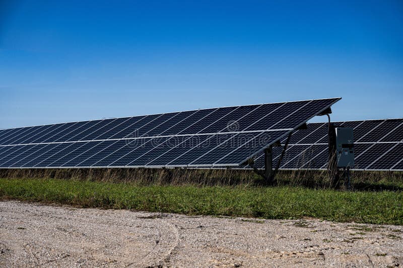 Modern Facility, with a Row of Solar Panels Remaining, Standing in ...