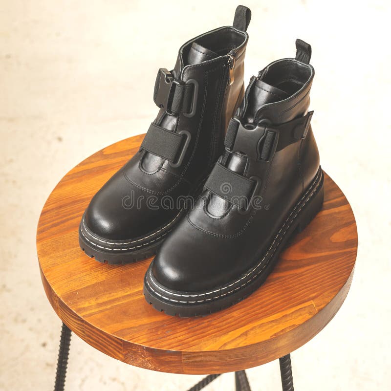 Modern Female Boots on a Wooden Stand in Studio Stock Image - Image of ...