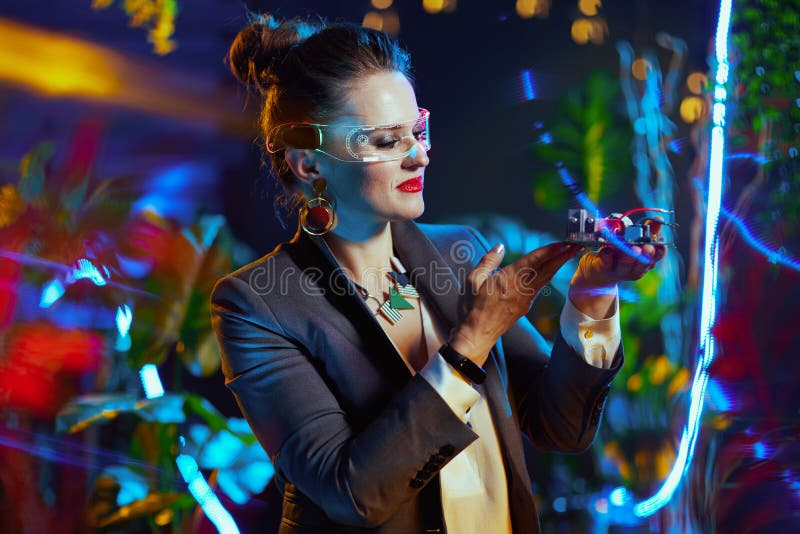 Modern Female with Futuristic Goggles in Virtual Reality Stock Photo ...