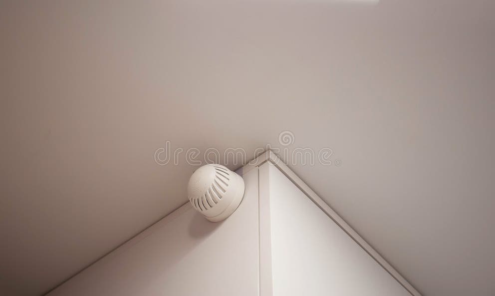 Modern Fire Detector on a White Ceiling. Smoke Safety Concept in Case ...