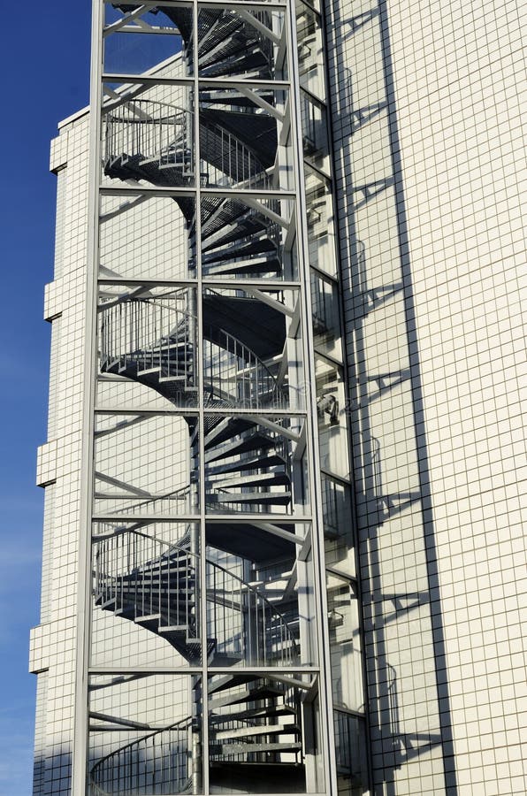 Modern Fire Escape Twisted Sunlit Stock Image - Image of apartment ...