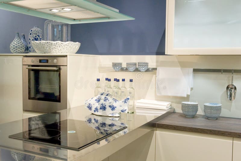 Modern Fitted Kitchen with Table and Glass Wall Stock Image - Image of ...