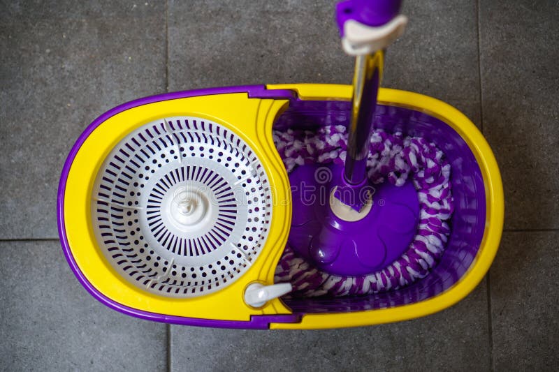 Modern Floor Mop Detail Propped Against the Wall Stock Image - Image of ...