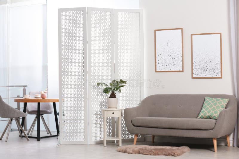Modern Folding Screen in Stylish Interior Stock Photo - Image of style ...