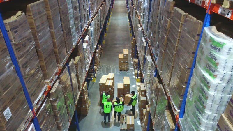 Modern Forklift in a Warehouse. Workflow in a Modern Warehouse. Large ...