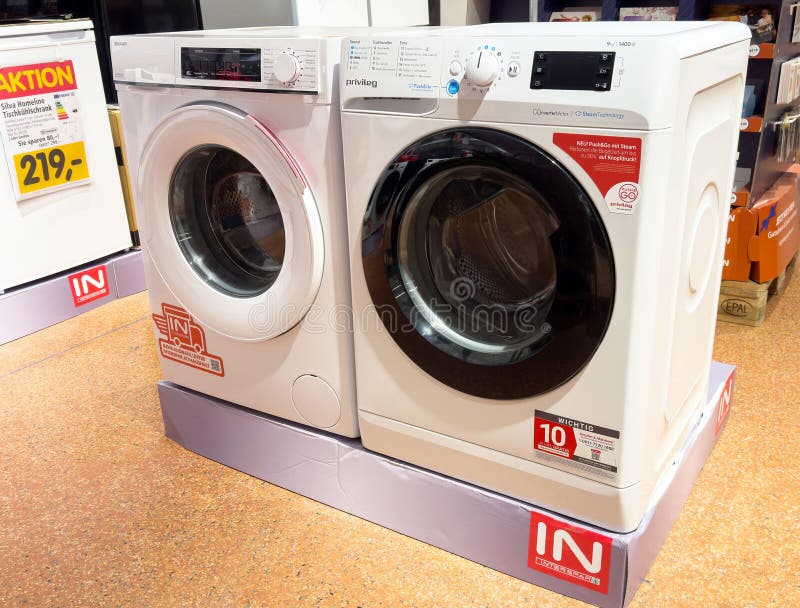 Modern Front-loading Washing Machines in Appliance Store Display ...