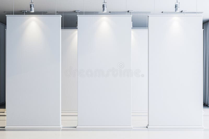 Modern Gallery Interior with Blank White Panels and Overhead Lighting ...
