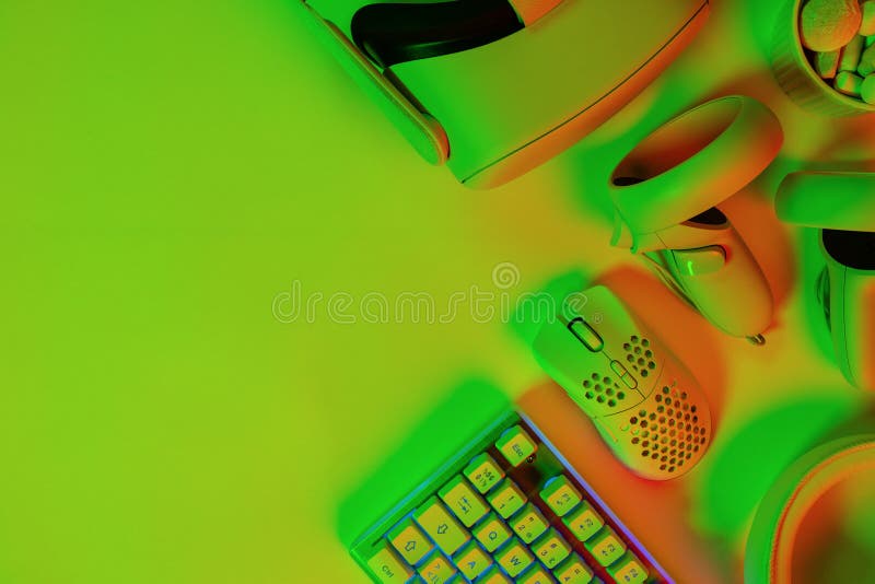 Modern Gaming Accessories on Green Desk Stock Photo - Image of ...