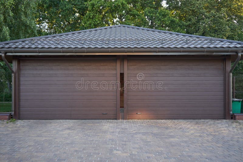 Modern Garage and Automatic Double Garage Door Stock Photo - Image of ...