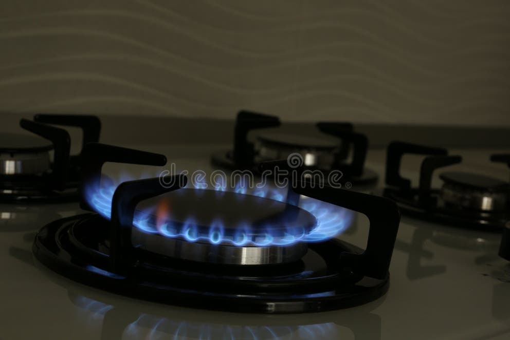 Modern Gas Cooktop with Burning Blue Flame in Kitchen Stock Photo ...