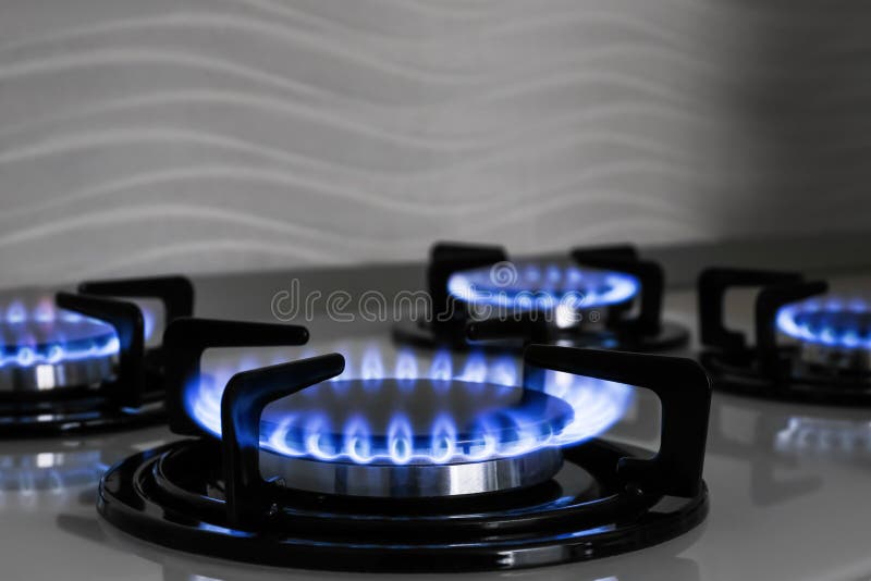 Modern Gas Cooktop with Burning Blue Flames in Kitchen Stock Image ...