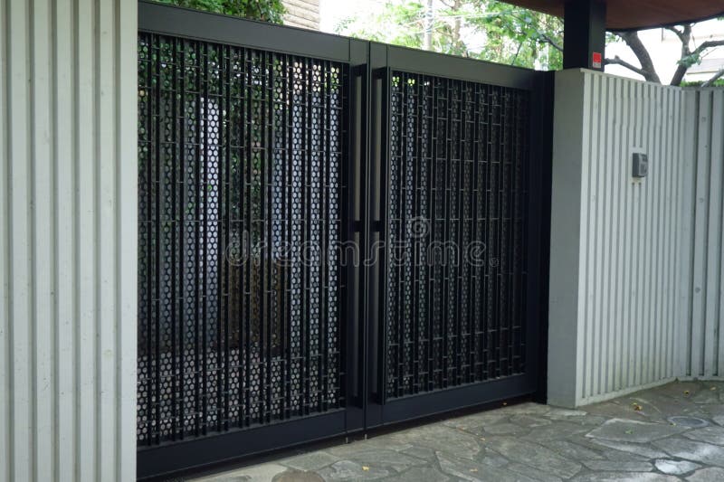 Strong modern gate stock image. Image of house, material - 209701025