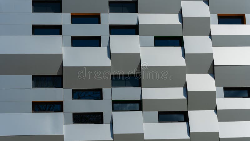 Modern Geometric Building Facade with Windows Stock Photo - Image of ...