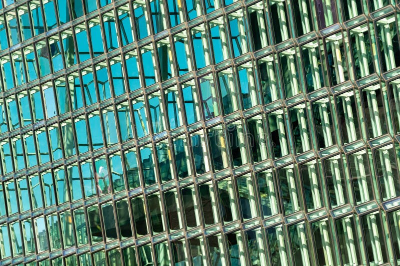 Modern Glass Facade Reflects Sky and Urban Architecture, Showcasing ...