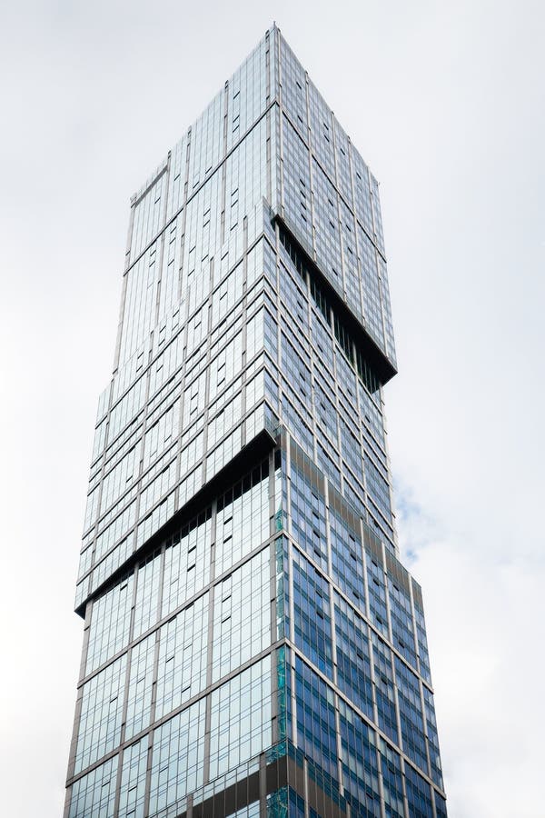 Modern glass skyscraper stock image. Image of building - 76079237
