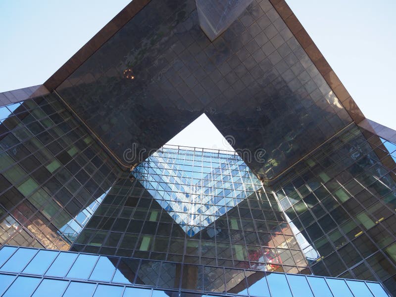 A Modern Glass Skyscraper Office Building Looking Up at Triangular Gap ...