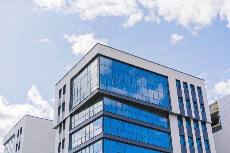 Modern Glass Tower with Blue Windows Stock Image - Image of angle ...
