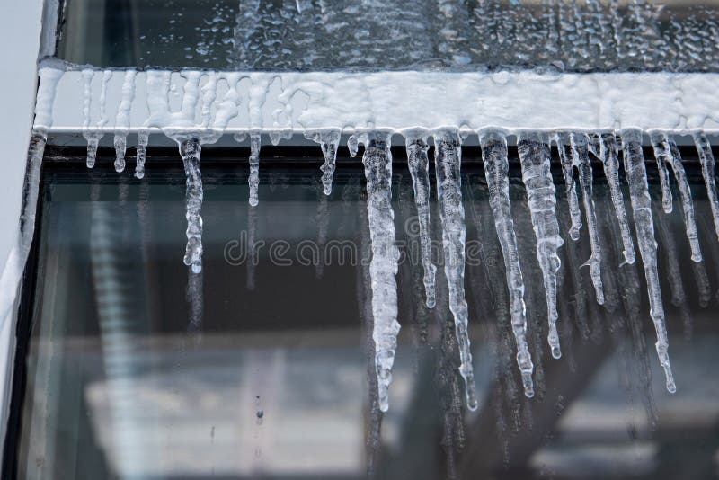 Modern Glazed Office Building. Icicles and Ice, Thaw Stock Image ...
