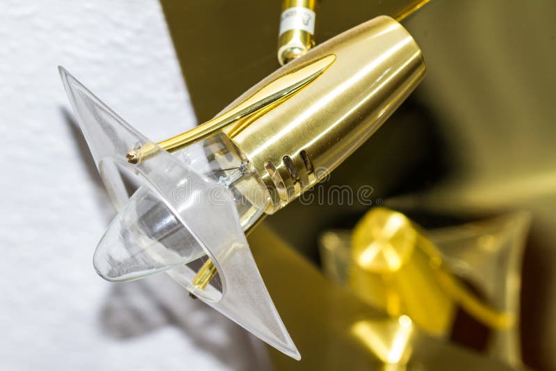 Modern Gold and Plastic Electric Light Fitting Stock Photo - Image of ...