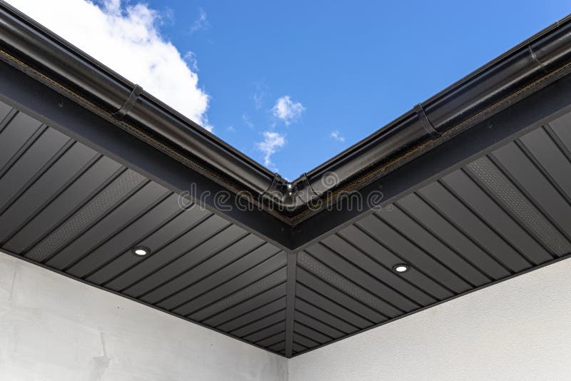 A Modern Graphite Herringbone Roof Lining is Attached To the Trusses ...
