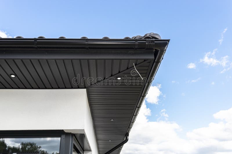 A Modern Graphite Herringbone Roof Lining is Attached To the Trusses ...