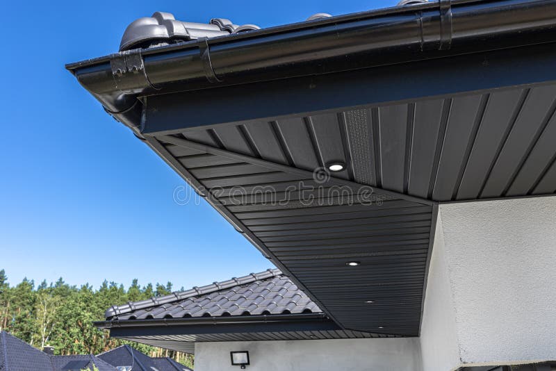 A Modern Graphite Herringbone Roof Lining is Attached To the Trusses ...