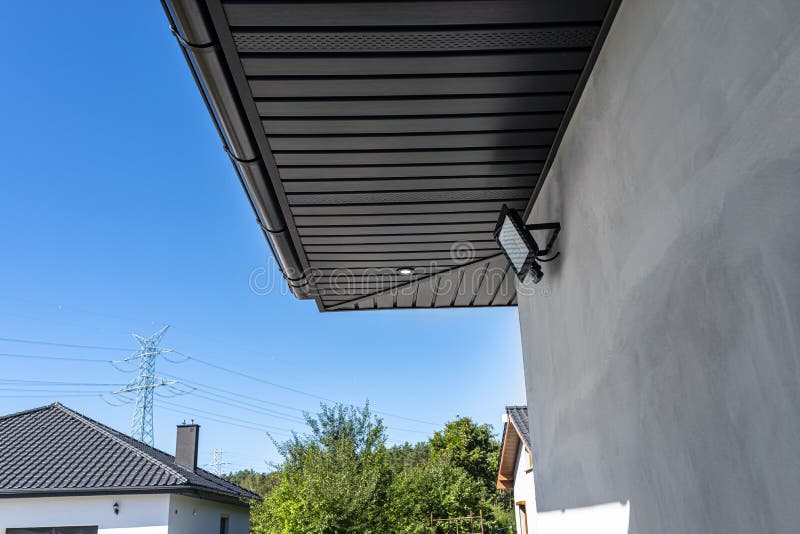 A Modern Graphite Herringbone Roof Lining is Attached To the Trusses ...