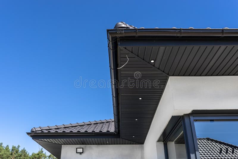 A Modern Graphite Herringbone Roof Lining is Attached To the Trusses ...