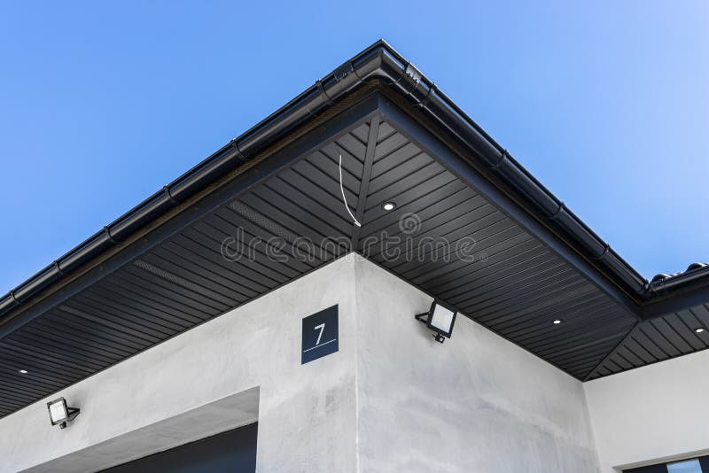 A Modern Graphite Herringbone Roof Lining is Attached To the Trusses ...