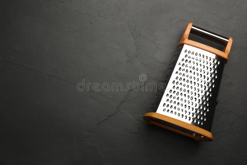 Modern Grater on Black Table, Top View. Space for Text Stock Photo ...